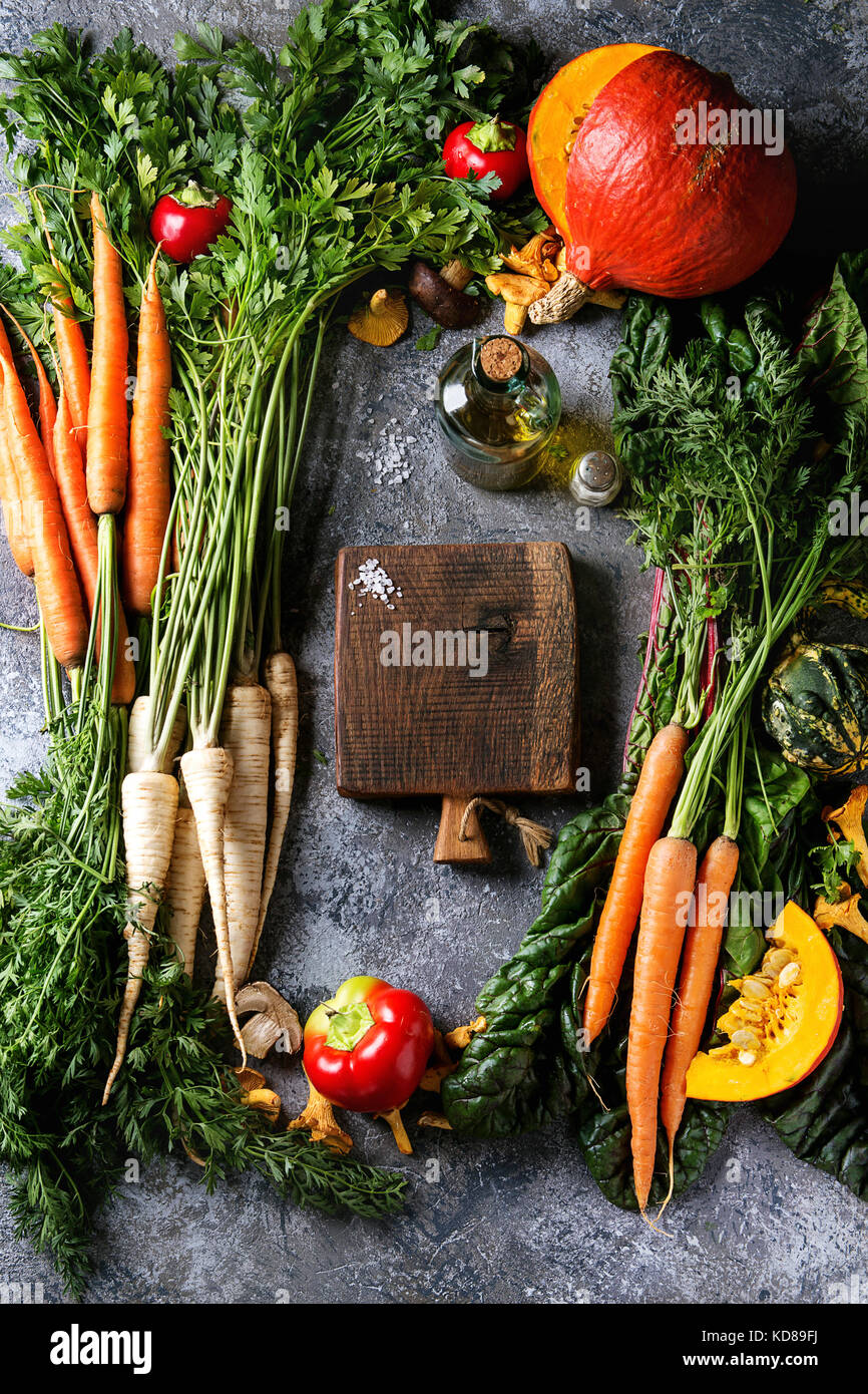 Variety of autumn harvest vegetables carrot, parsnip, chard, paprika ...
