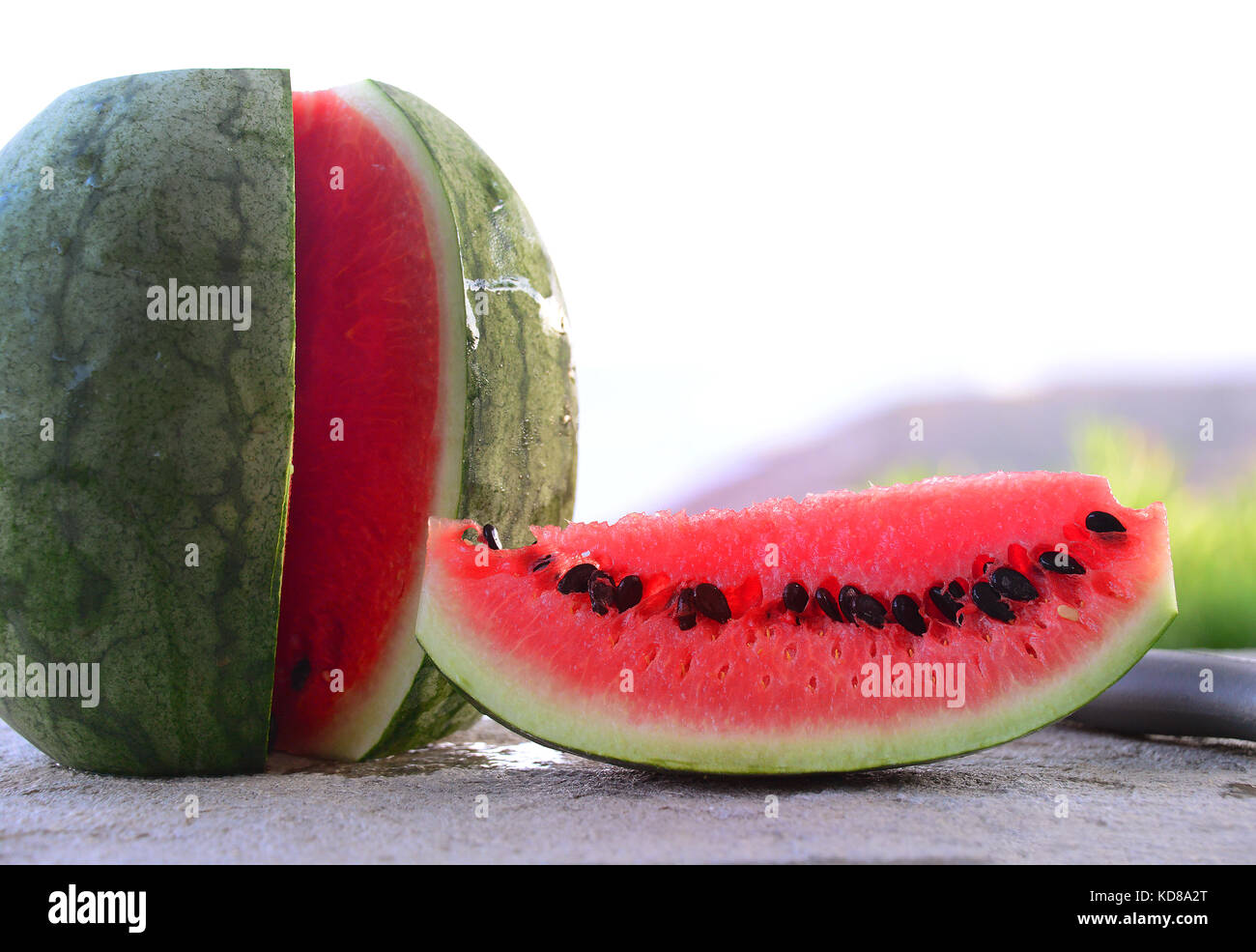 Watermelon and watermelon slice Stock Photo - Alamy
