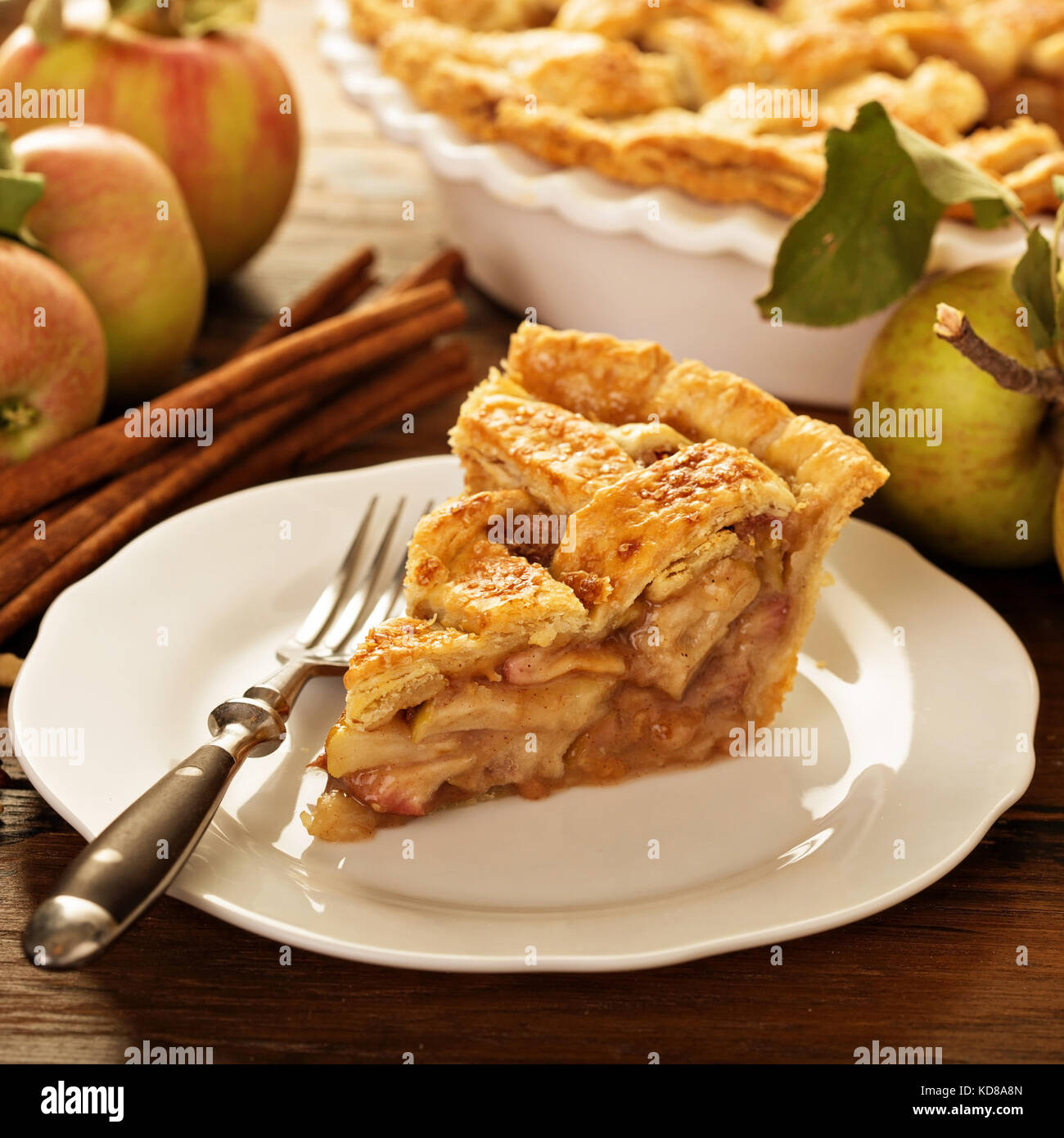 Piece of an apple pie on a plate Stock Photo - Alamy