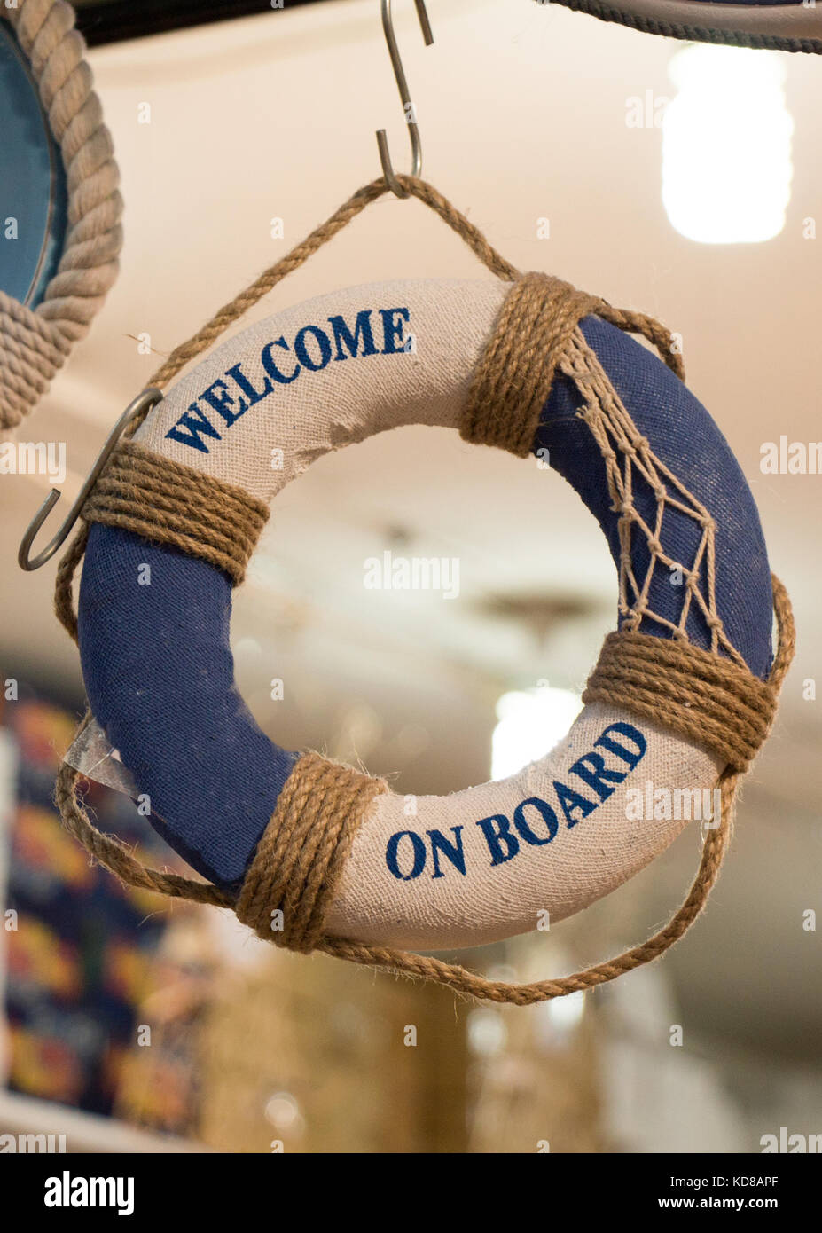 Lifesaver or life preserver with rope around for a drowning person to ...