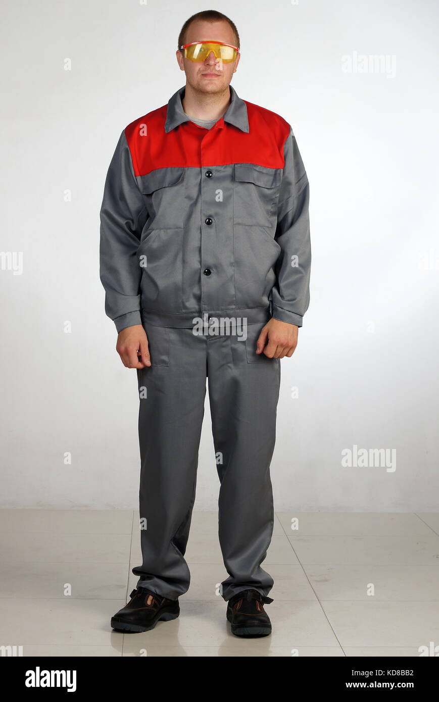A man in overalls and work wear.Isolated studio portarit Stock Photo ...