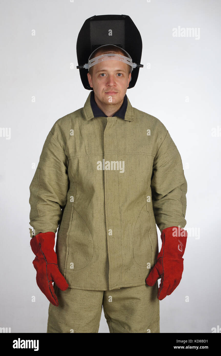 A man in overalls and work wear.Isolated studio portarit Stock Photo ...