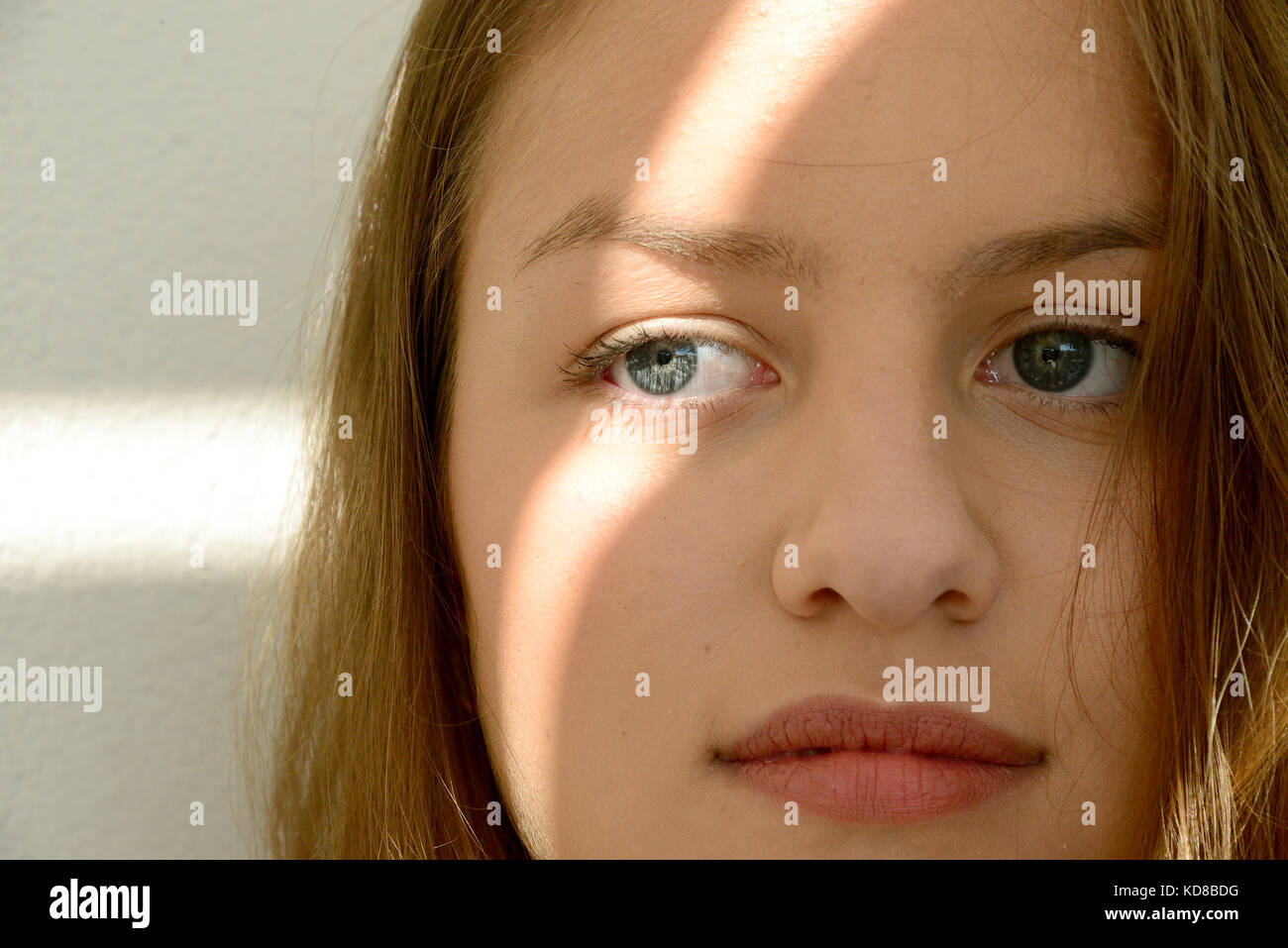 Portrait of a teenage girl with the sun on her face Stock Photo - Alamy