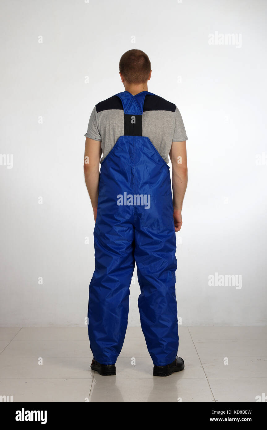 A man in overalls and work wear.Isolated studio portarit Stock Photo ...