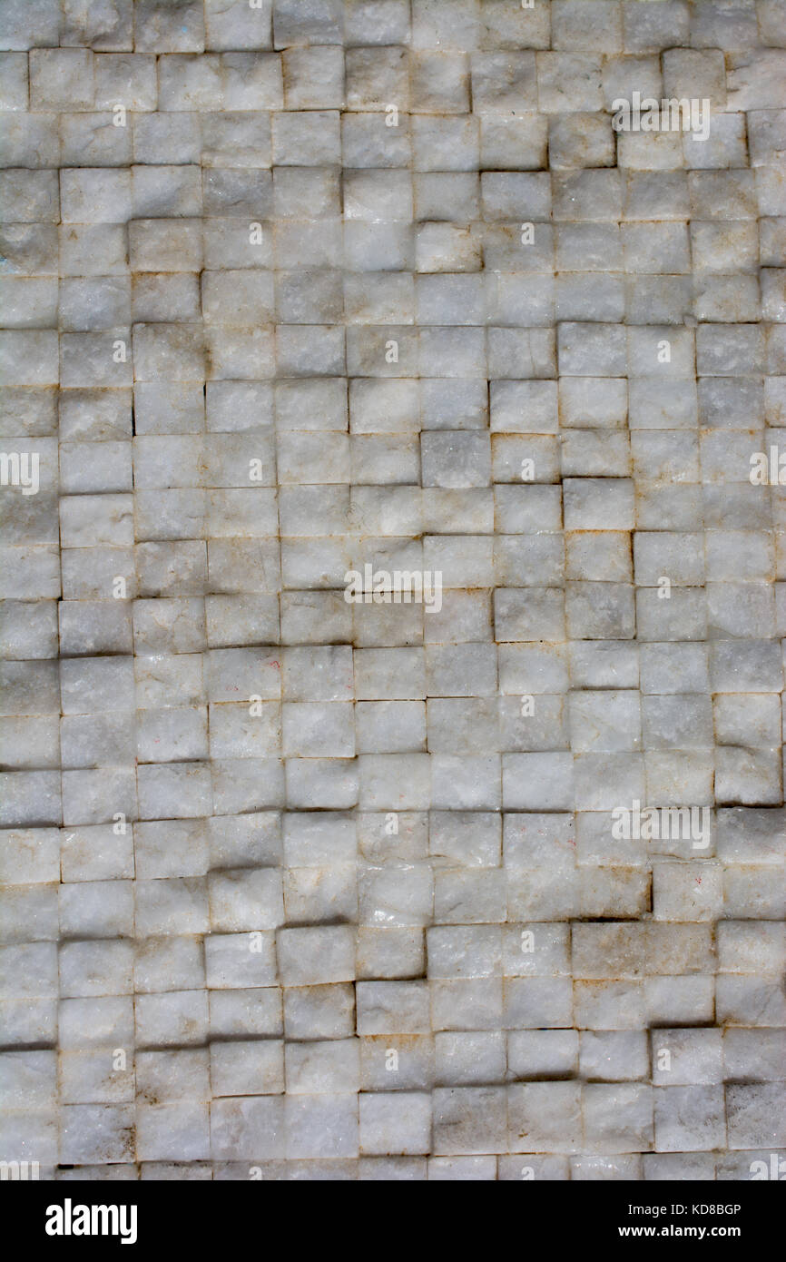 Decorative cubic stone wall as background texture Stock Photo - Alamy