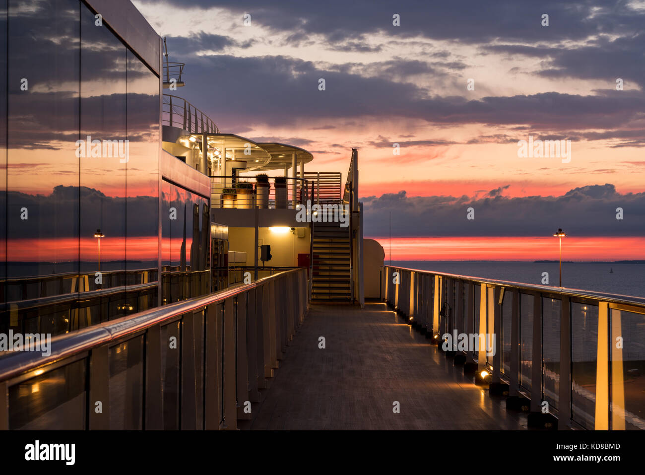 Cruise ship deck at sunset Stock Photo - Alamy