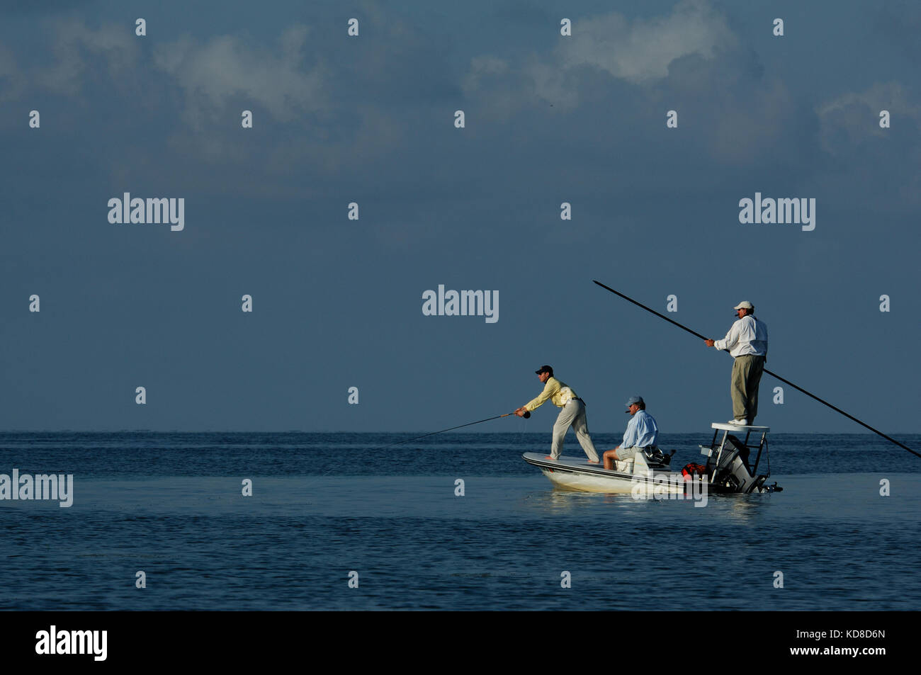 Fishermen fly fishing for tarpon bonefish and permit in the Florida ...