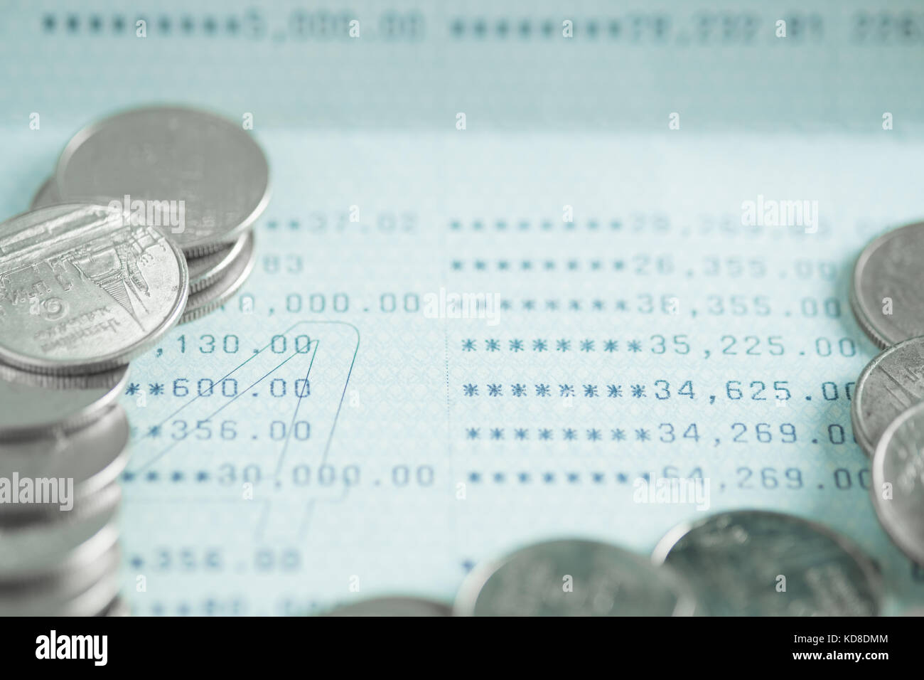 Stacks of coins and account book or credit card with copy space ...