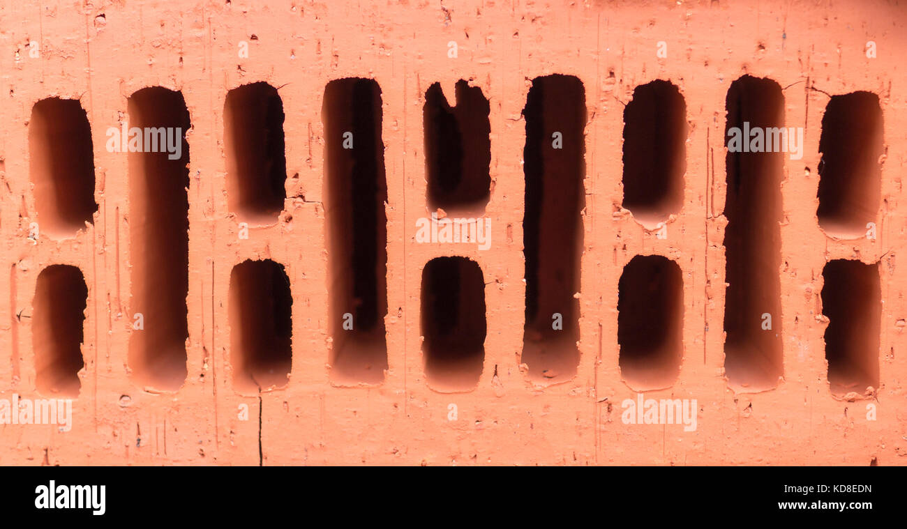orange clay brick stack, pile. texture, background Stock Photo - Alamy