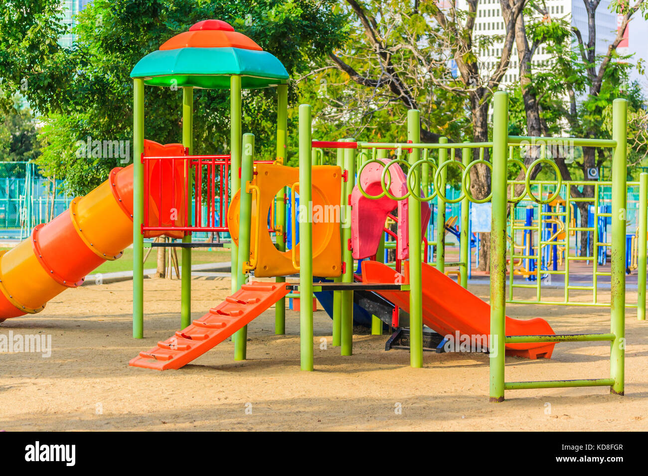 Colorful children playground in the public park Stock Photo - Alamy