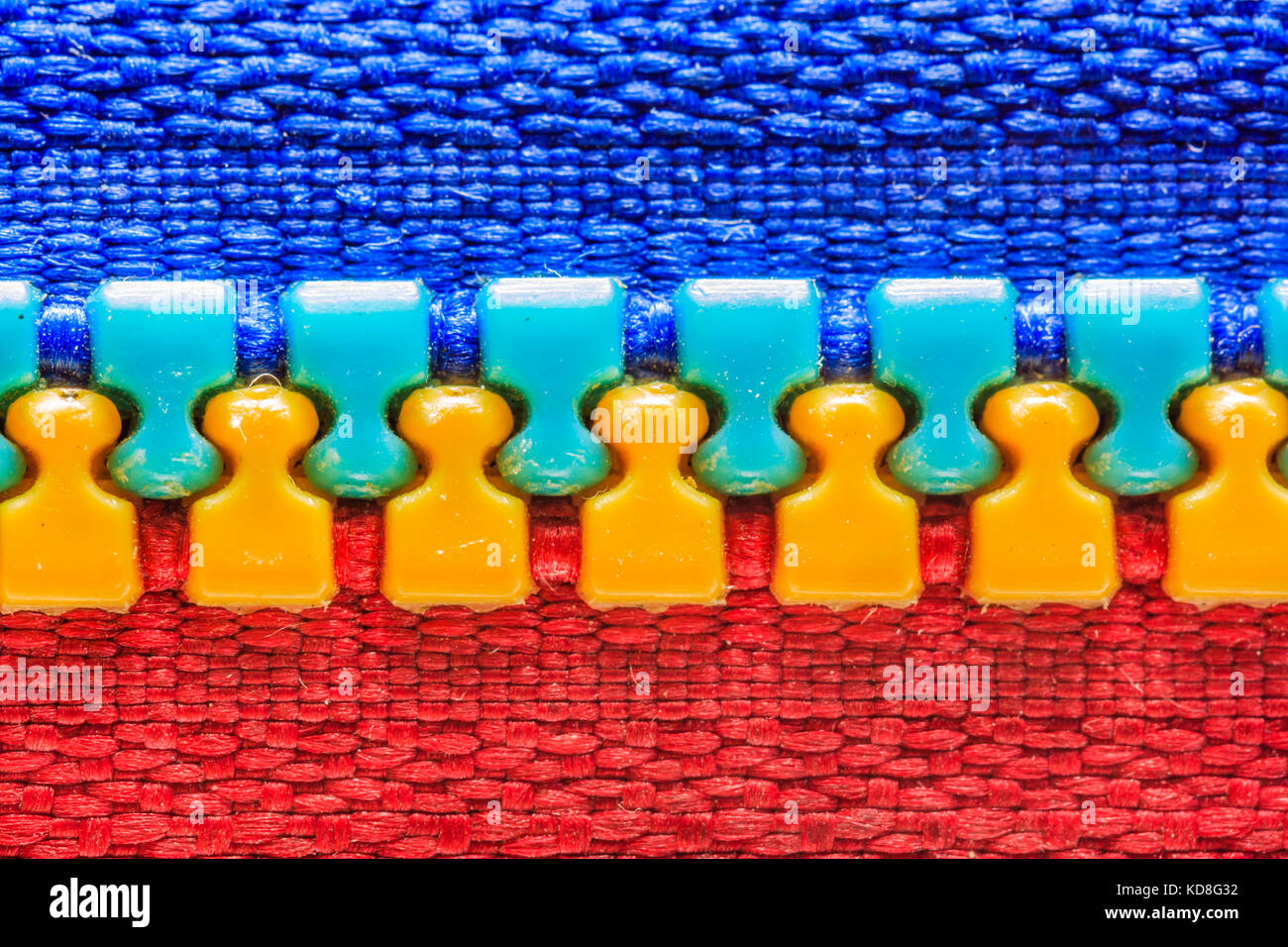 Closeup of colourful zipper with fabric texture Stock Photo - Alamy
