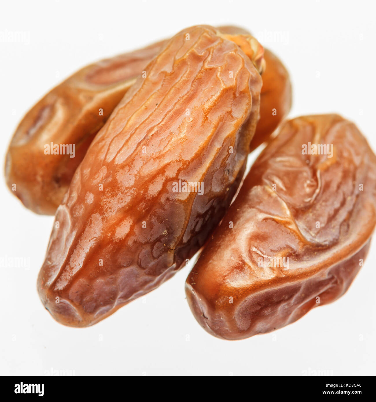 dried dates isolated on white background Stock Photo - Alamy