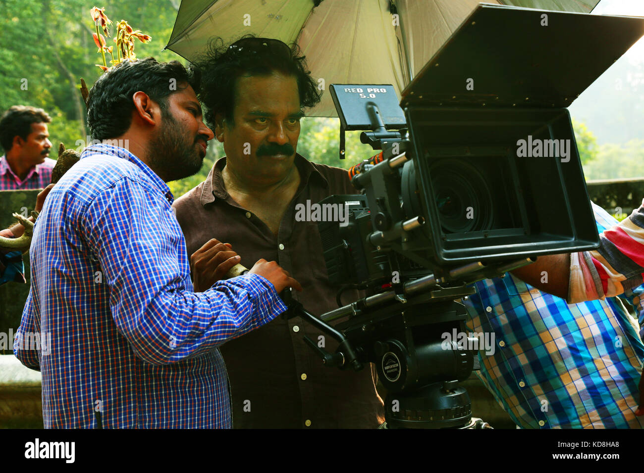 Video camera operator on nature background, film shooting spot Stock ...