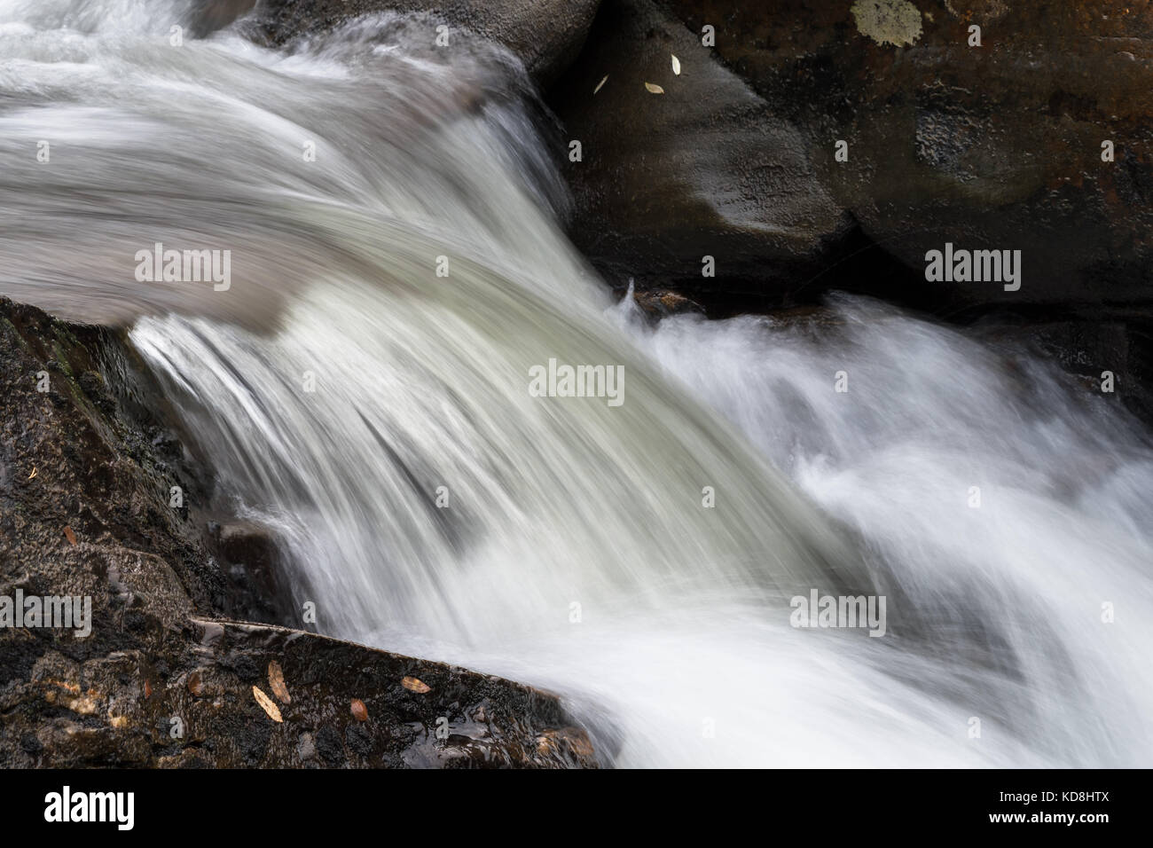 Small waterfall close up Stock Photo - Alamy