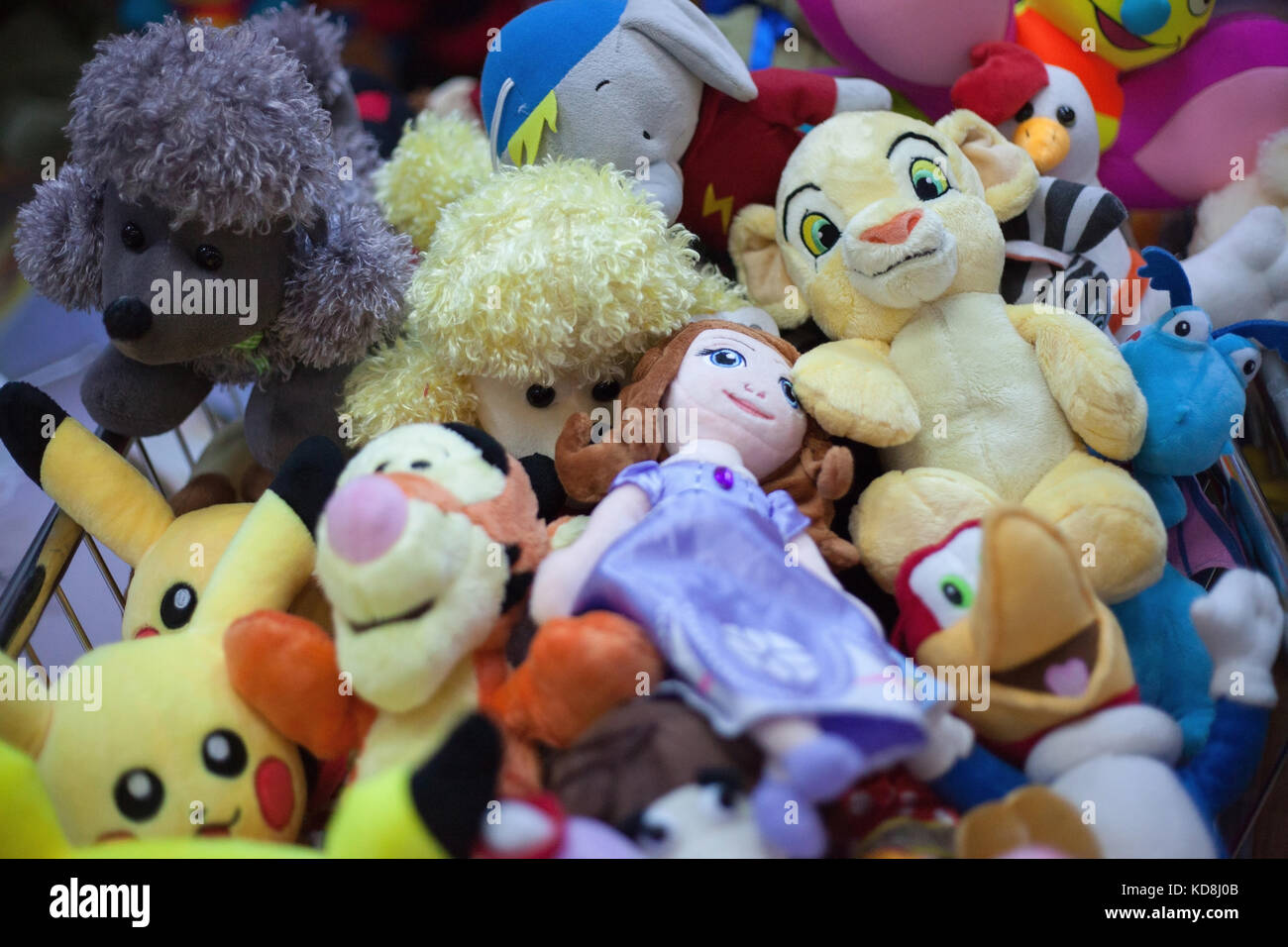 Different fluffy toys for children stacked for sale in a shop Stock ...