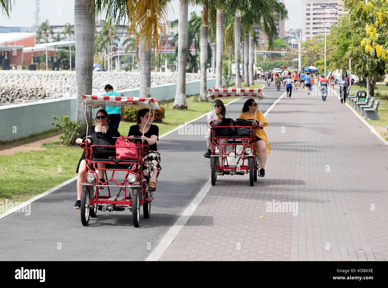 Four wheel fun bicycle carts in the traffic free area on Sunday in ...