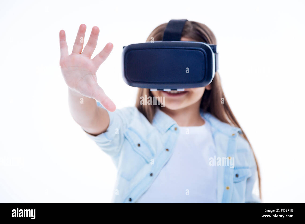 Happy positive girl being in a virtual reality Stock Photo - Alamy