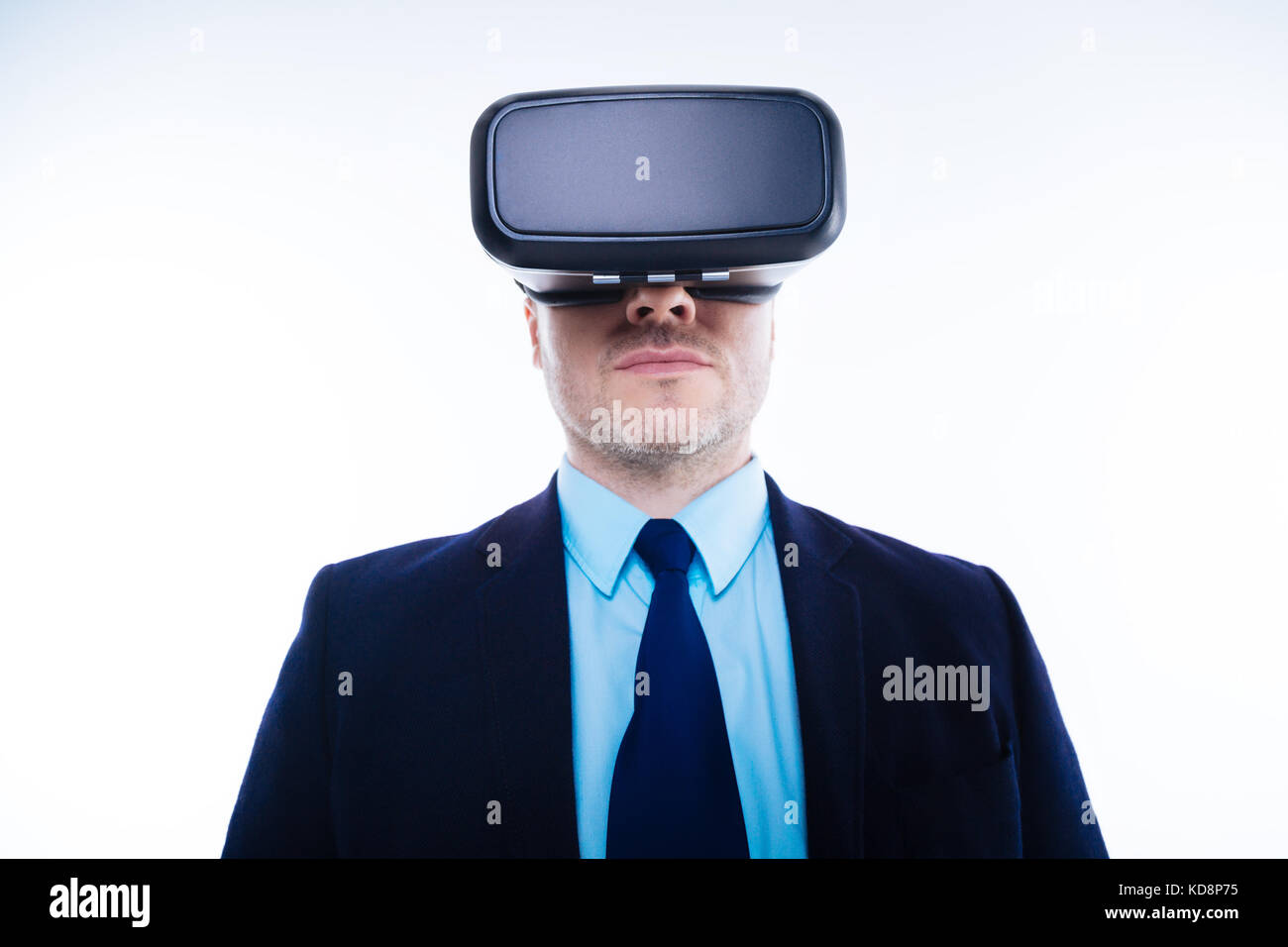 Serious professional businessman using latest technology Stock Photo ...