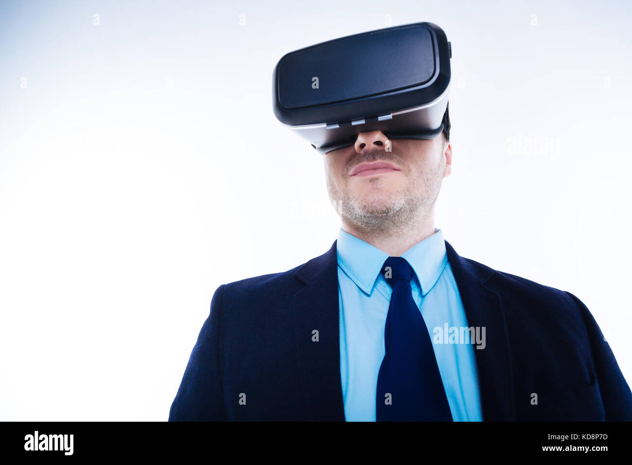 Intelligent smart man wearing 3d reality glasses Stock Photo - Alamy