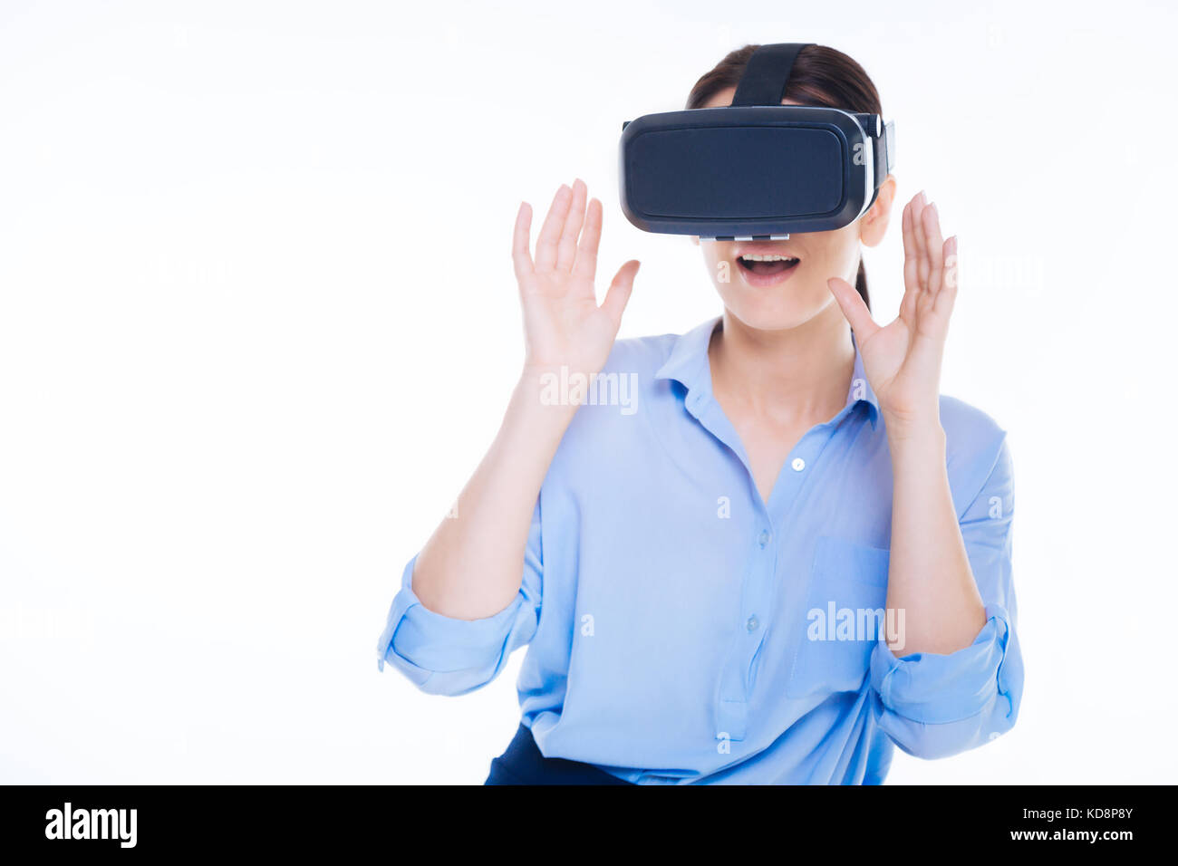 Pleasant young woman wearing 3d reality glasses Stock Photo - Alamy