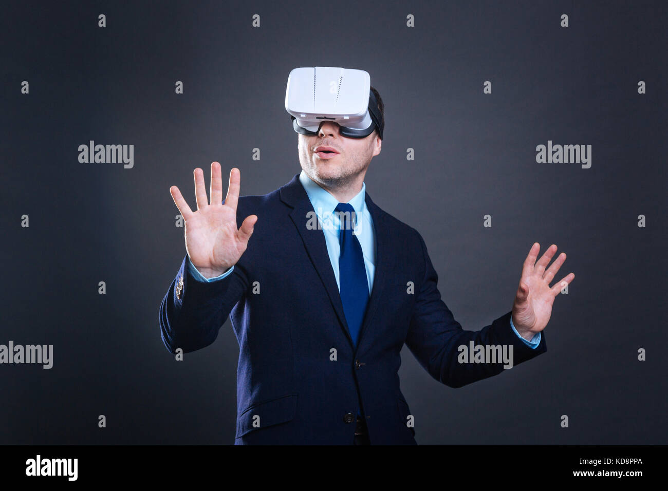 Smart successful businessman enjoying modern technology Stock Photo - Alamy