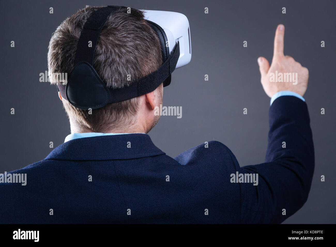 Nice adult man using sensory panel Stock Photo - Alamy