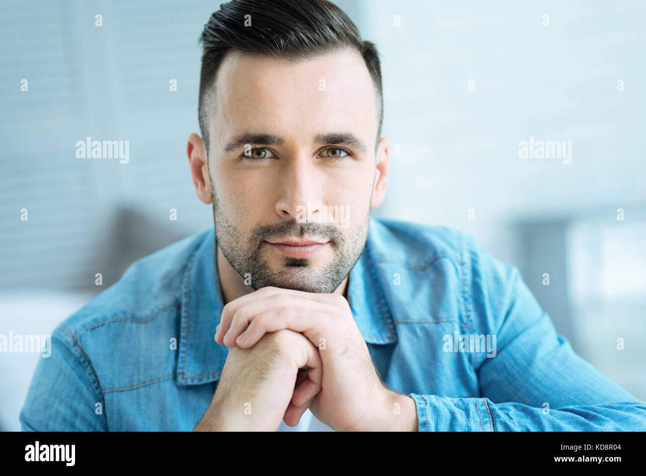 Stylish businessman posing confidently hi-res stock photography and ...