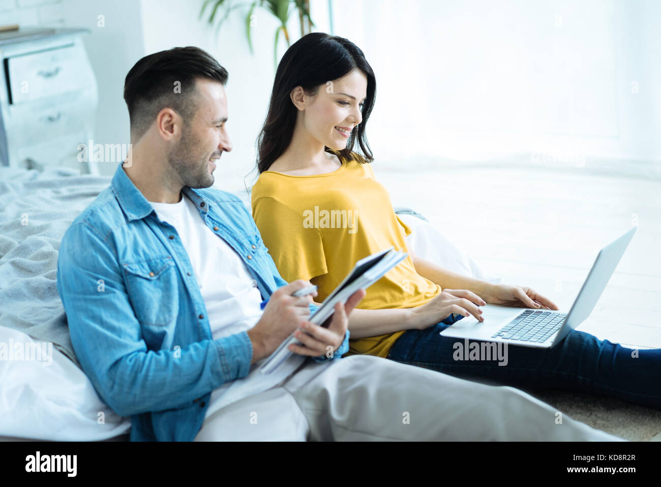 Friendly groupmates studying together Stock Photo - Alamy