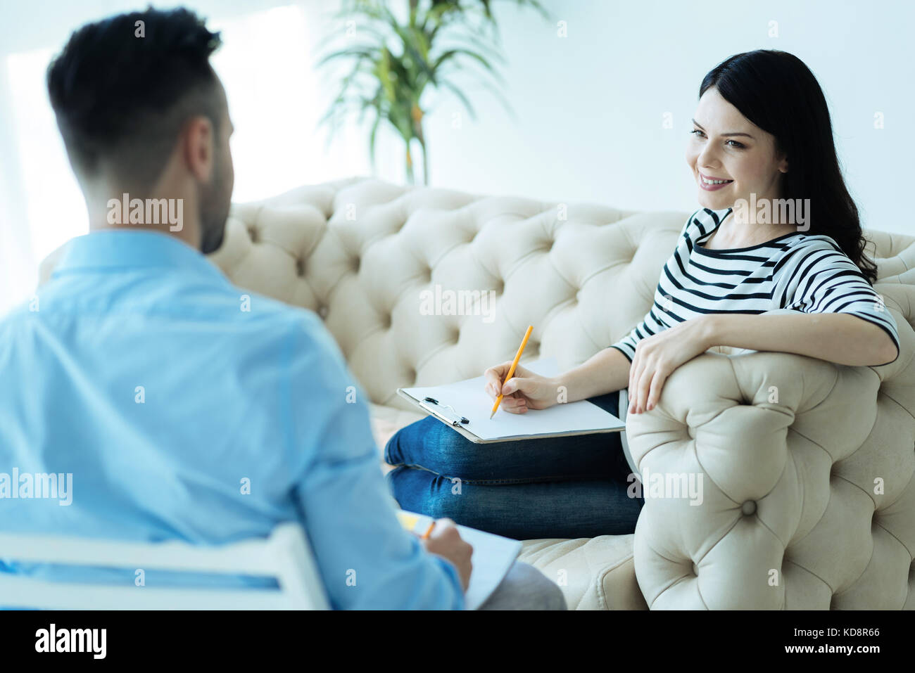 Friendly colleagues in casual enjoying working together Stock Photo - Alamy