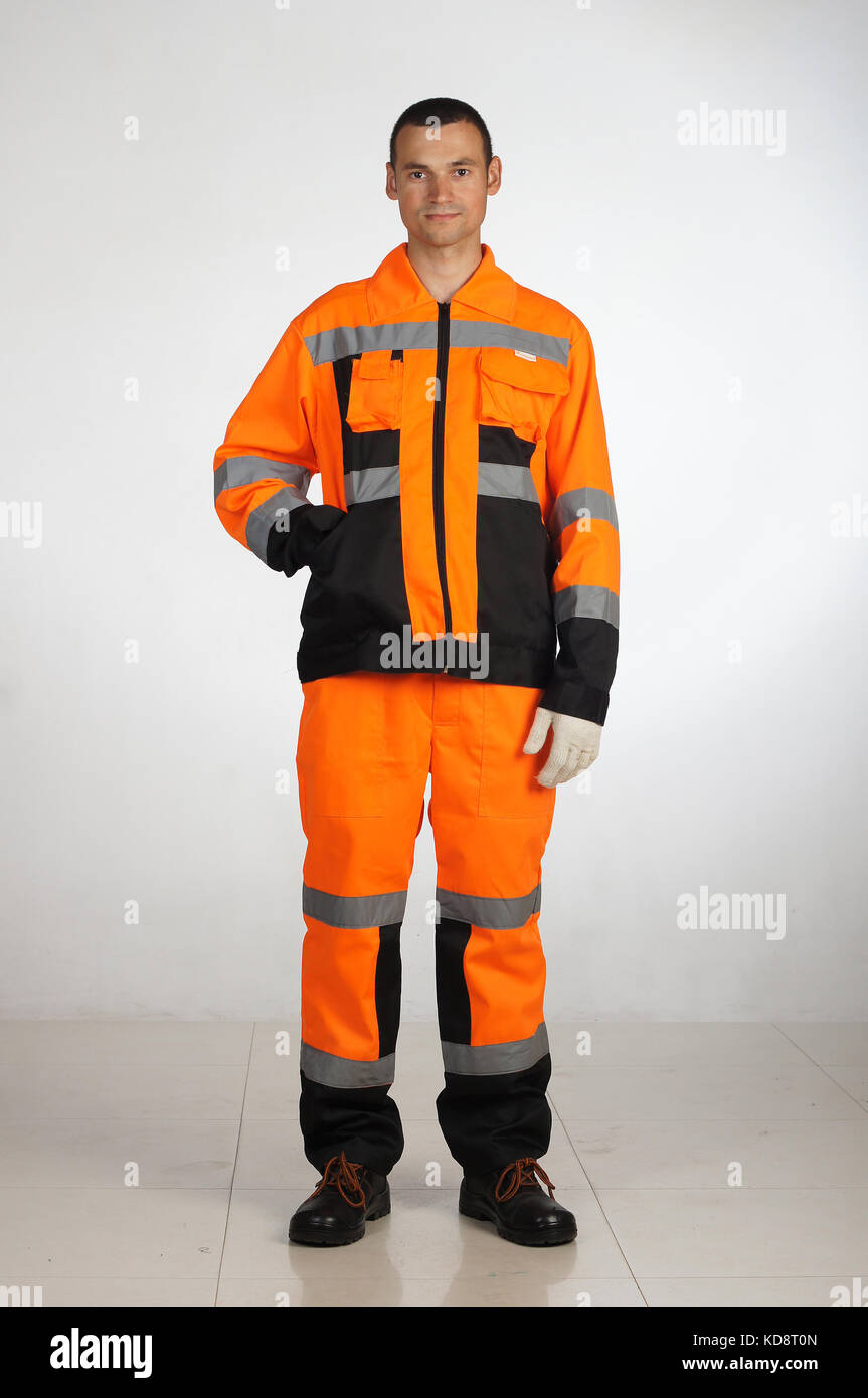 A man in overalls and work wear.Isolated studio portarit Stock Photo ...