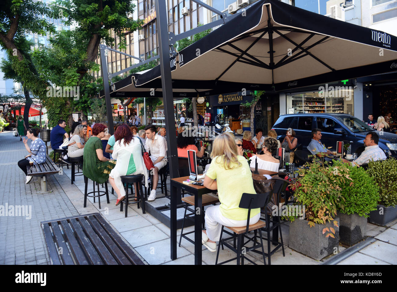 Local Greeks love socializing in the local cafes and restaurants in ...