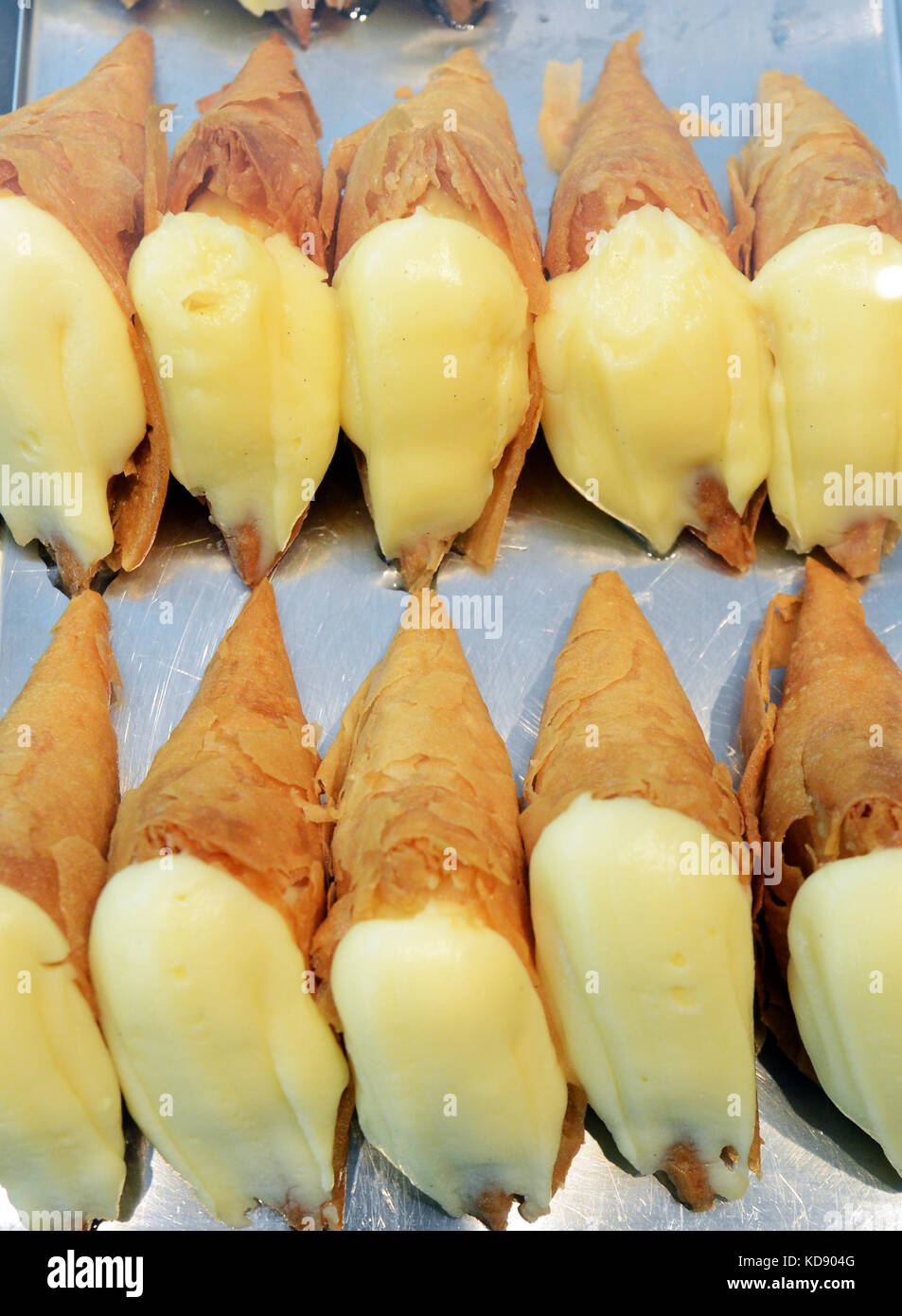 A tray of Trigona Panoramatos - (Phyllo Triangle Pastries with Custard ...