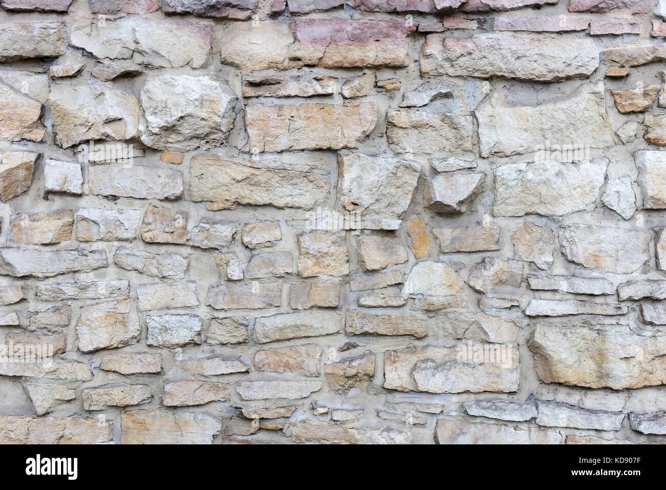 Background of stone wall texture photo Stock Photo - Alamy