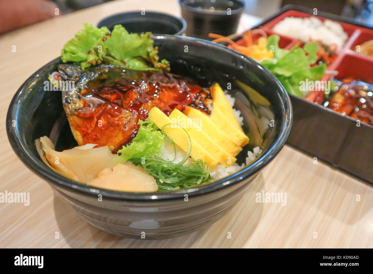 rice topped with fish or saba,Japanese food Stock Photo - Alamy