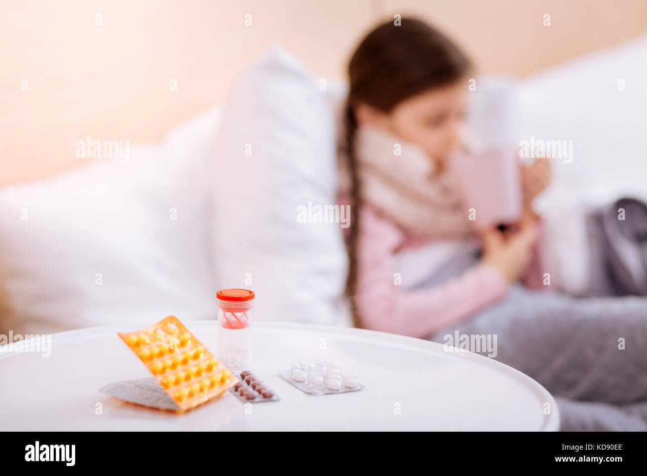 Three kinds of pills being placed on the table Stock Photo - Alamy