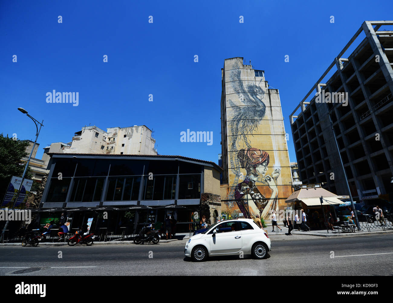 An old building painted with a beautiful wall painting in Thessaloniki ...
