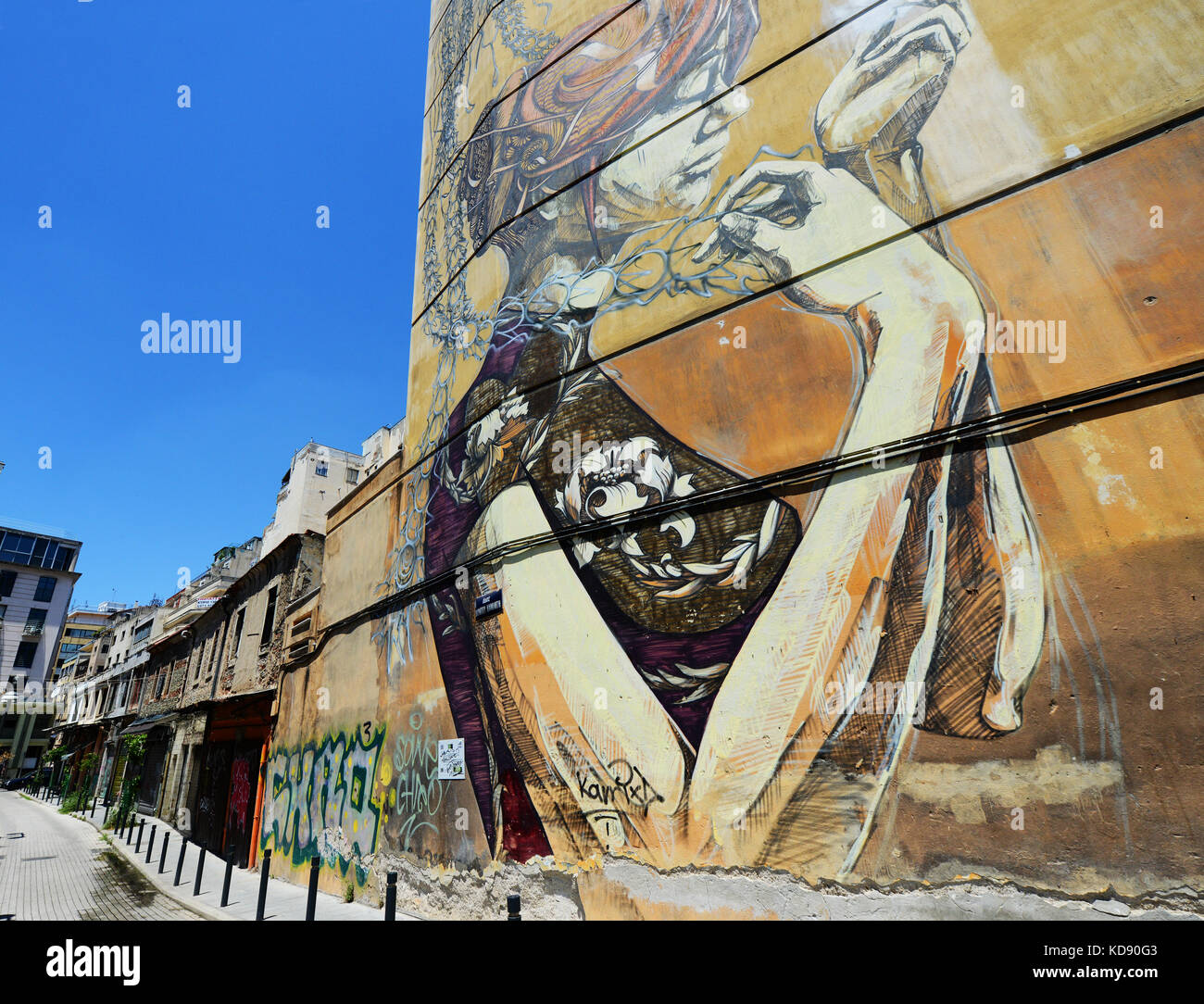 An old building painted with a beautiful wall painting in Thessaloniki ...