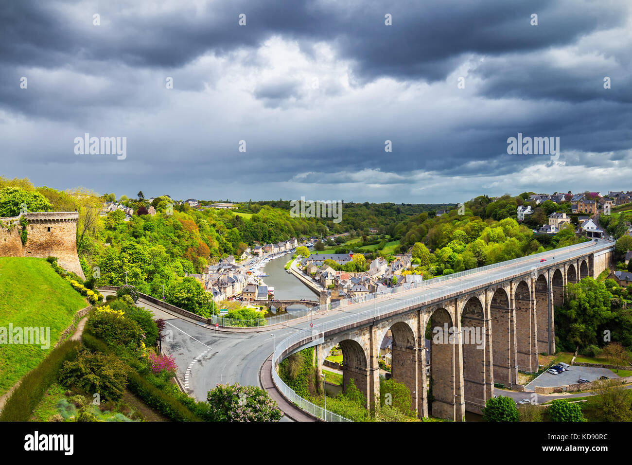Aerial view of the historic town of Dinan with Rance river with ...