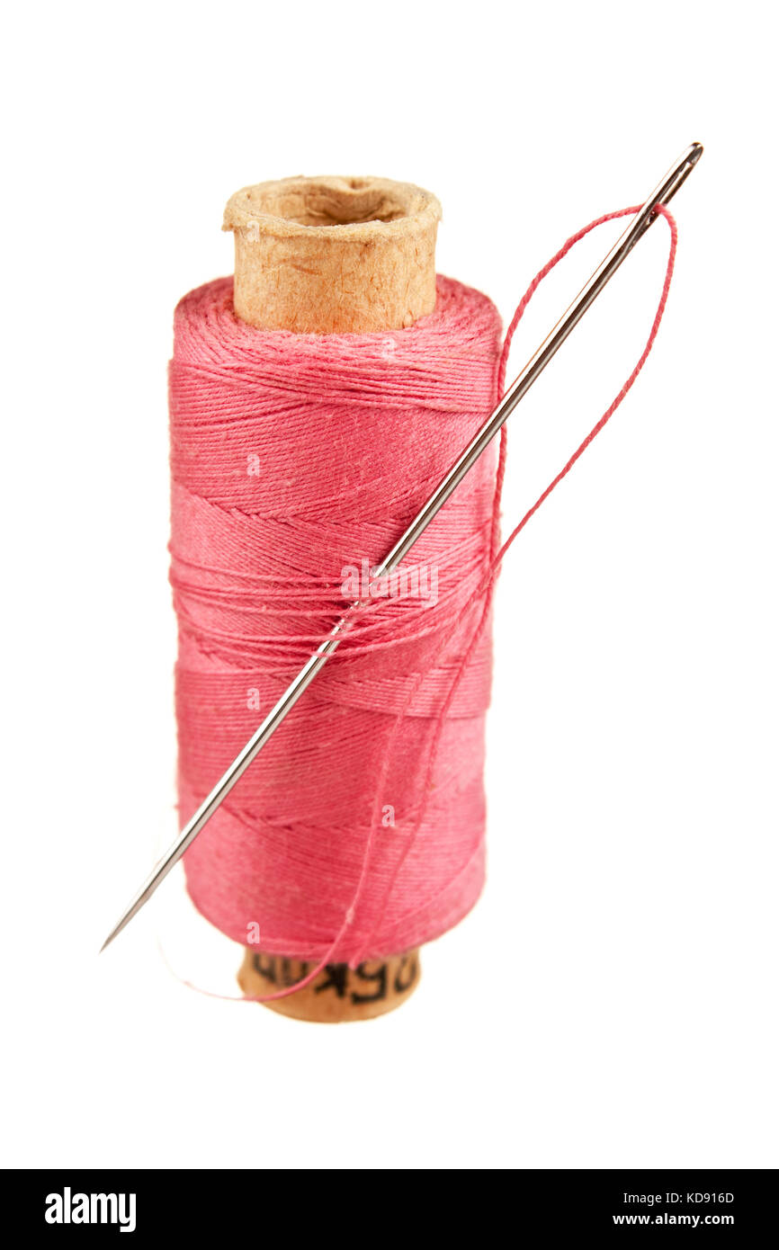 spool of thread and needle isolated on a white background Stock Photo ...