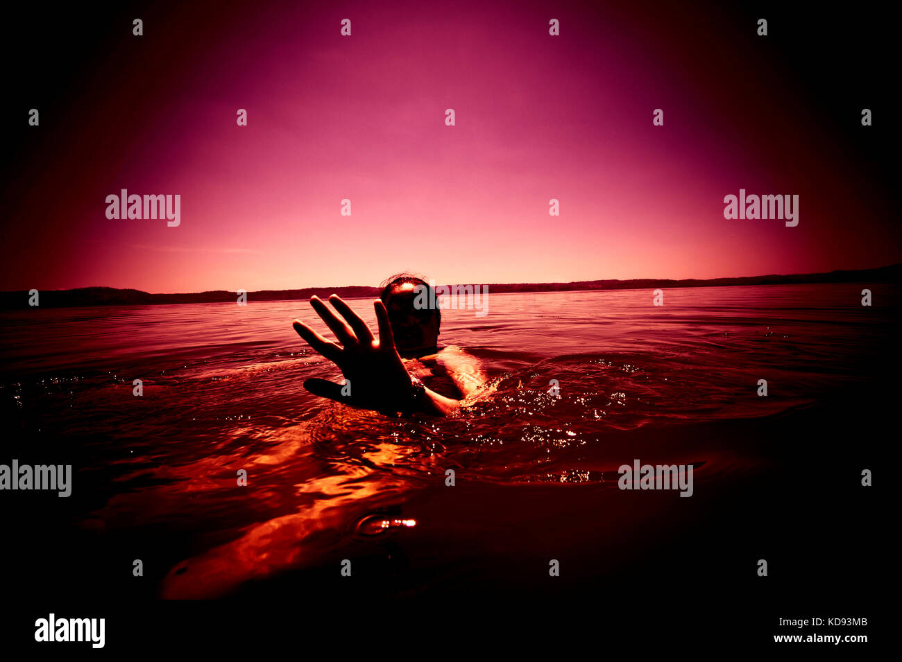 Woman swimming on a beach at Paapgayo Bay in Costa Rica Stock Photo - Alamy