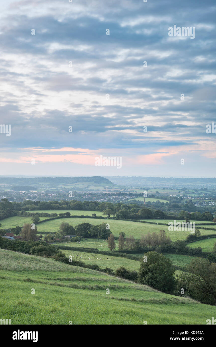 Beautiful sunrise landscape over Somerset Levels in English countryside ...