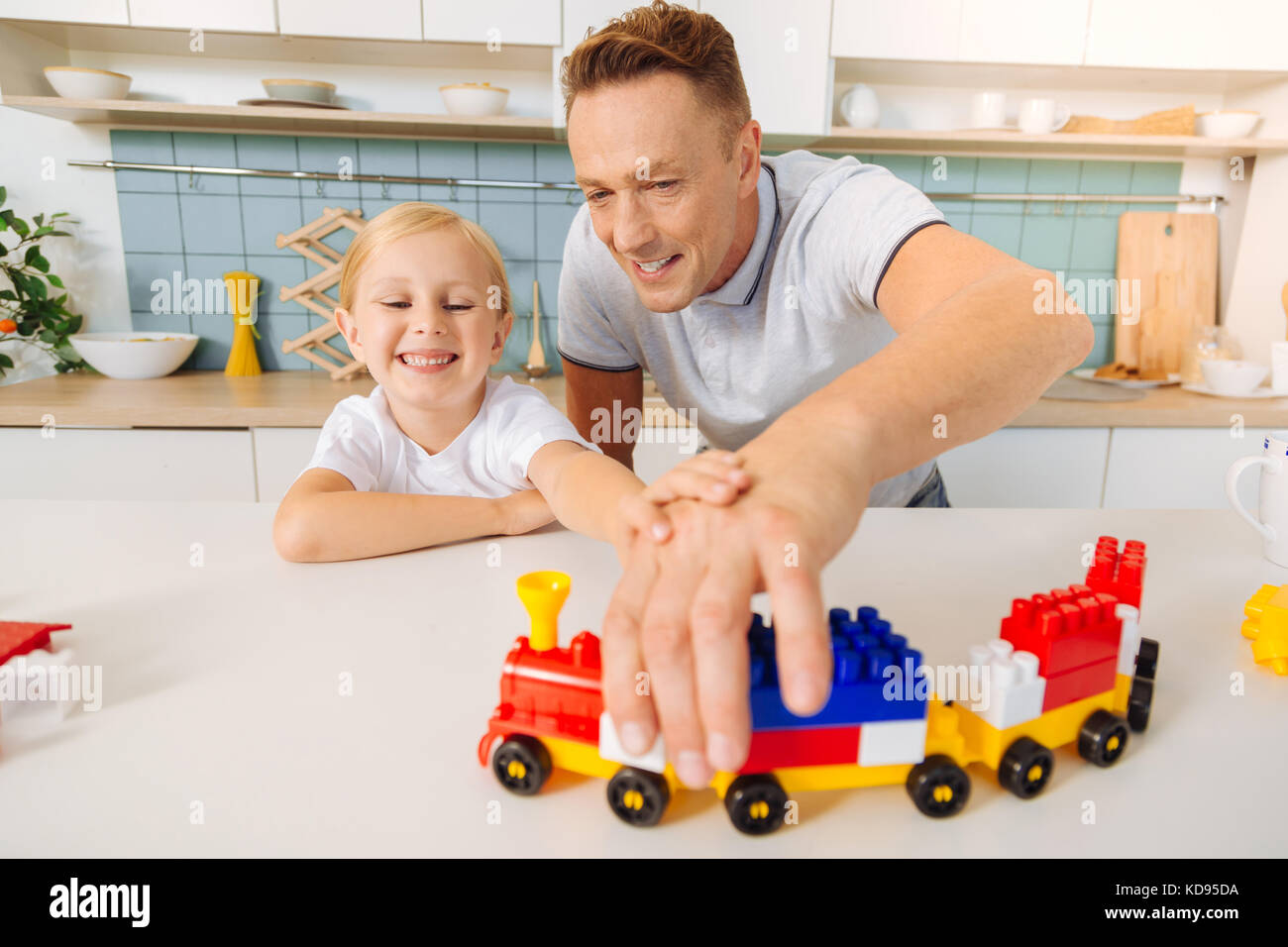 Happy child playing train father hi-res stock photography and images ...