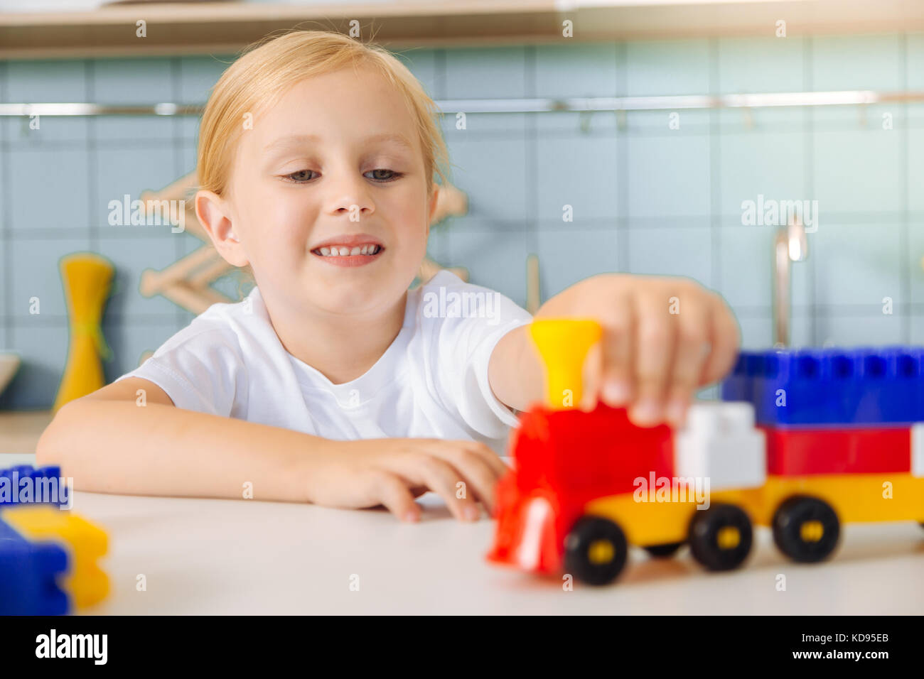 Pleasant nice girl playing at home Stock Photo - Alamy