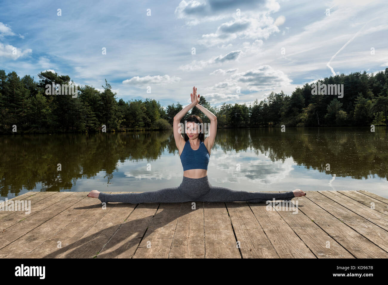 Woman doing splits on yoga hi-res stock photography and images - Alamy