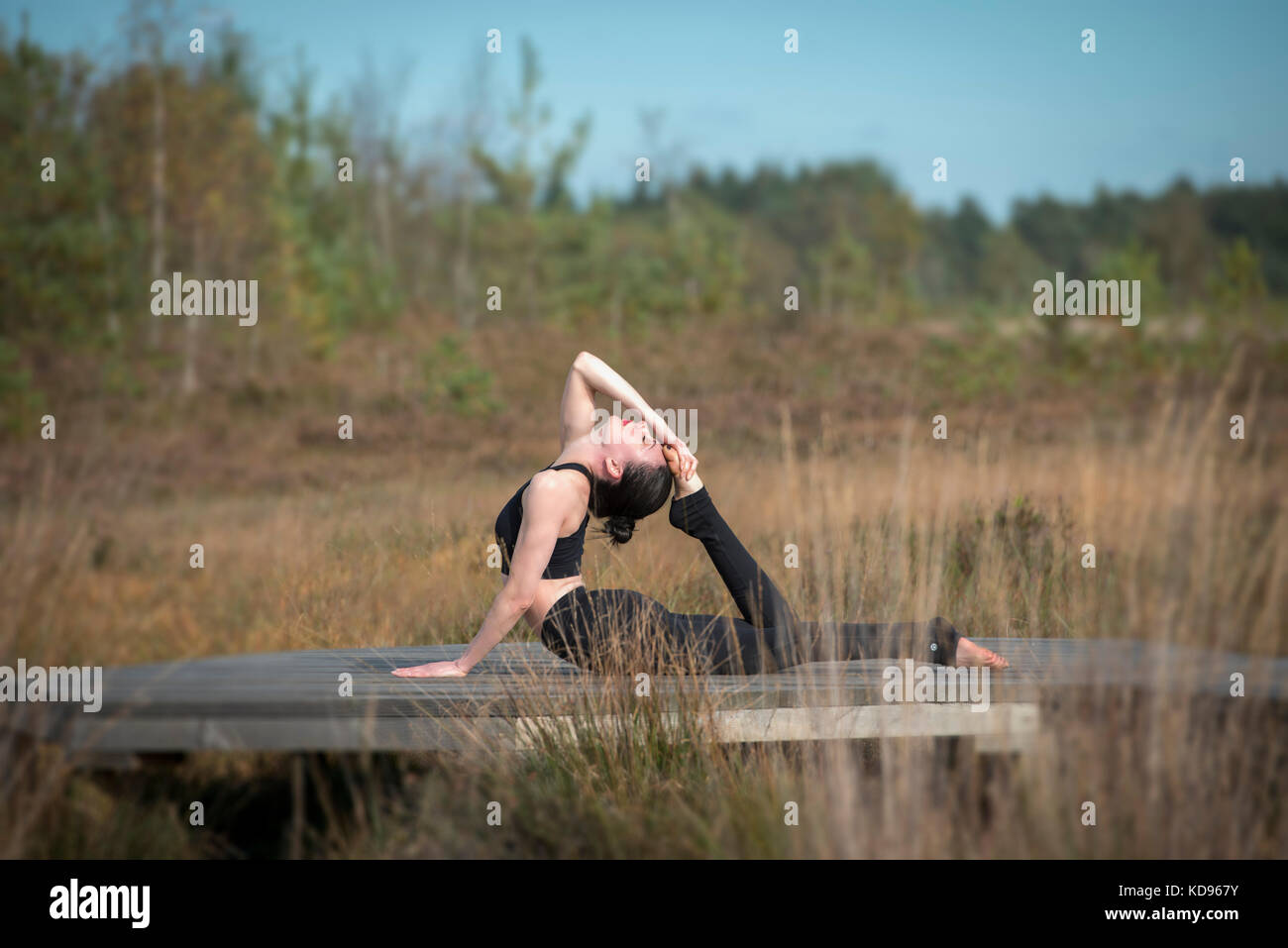 Yoga pose king cobra hi-res stock photography and images - Alamy