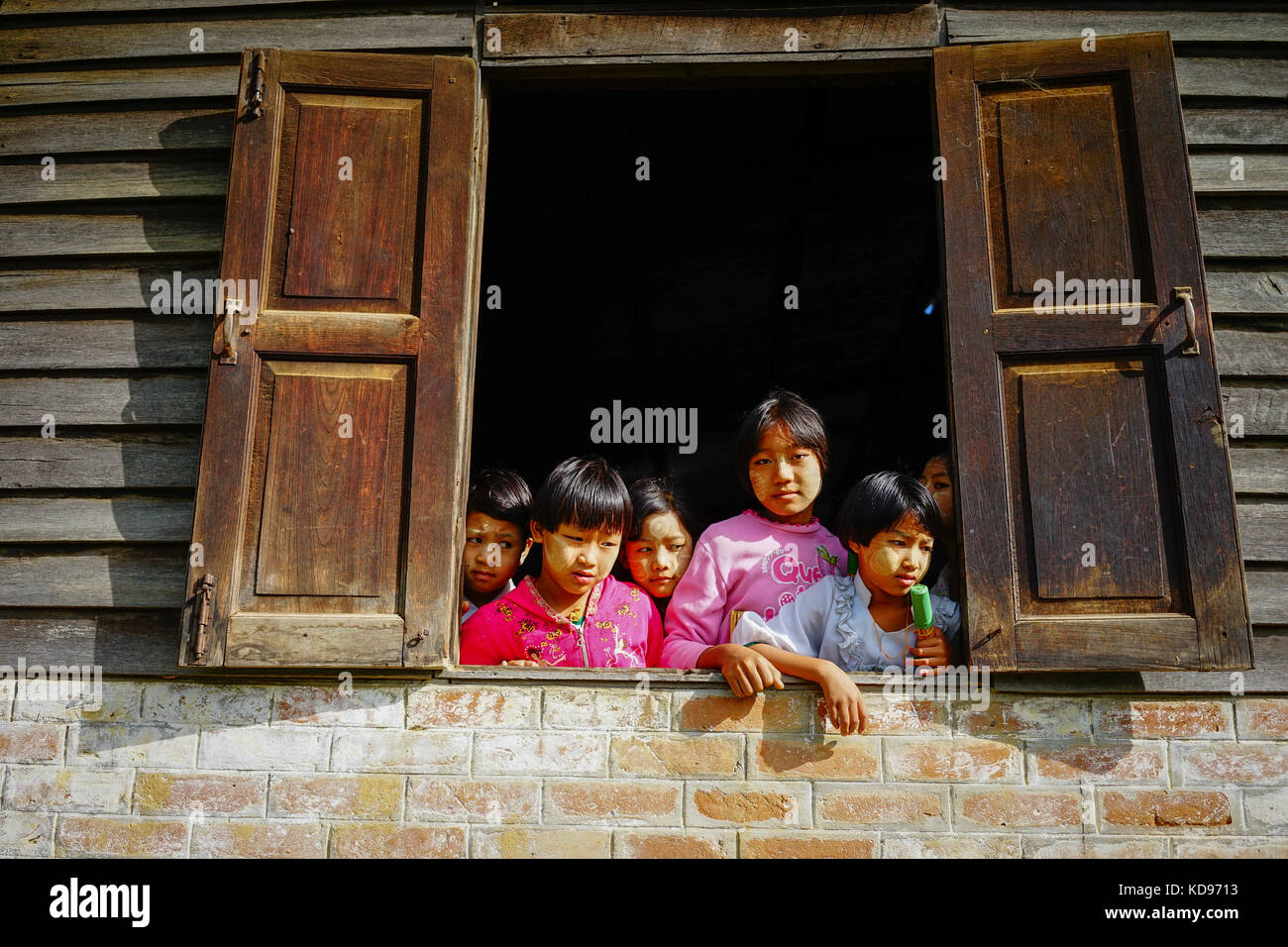 Yangon, Myanmar - Oct 17, 2015. Children playing at the poor village in ...