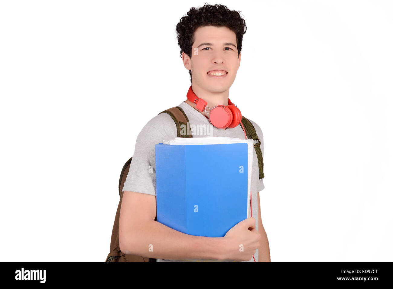 Portrait of young student holding notebook. Isolated white background ...