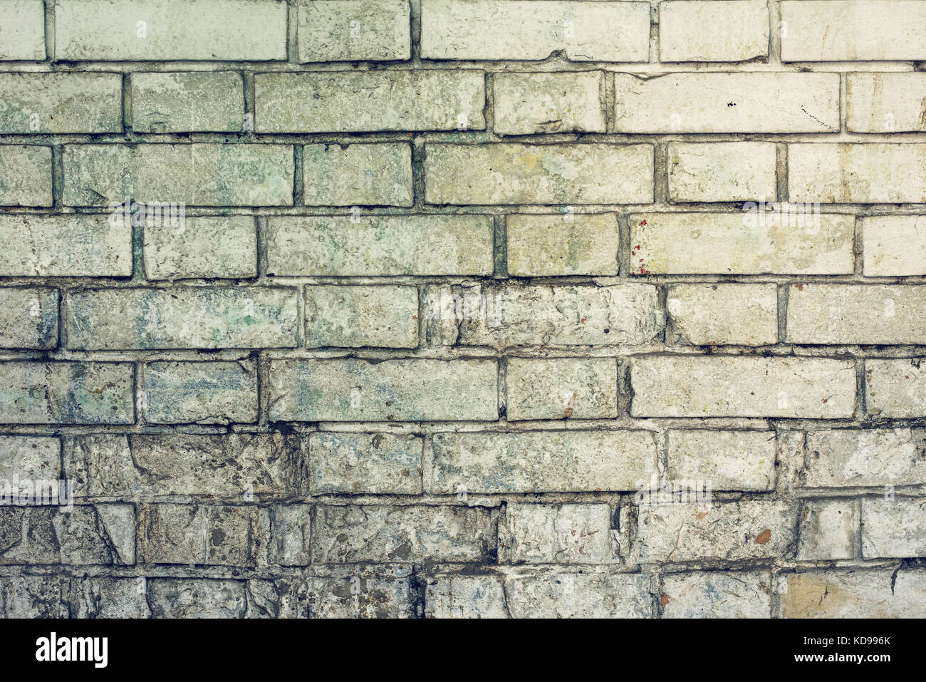Weathered rustic white brick wall surface texture with stains and ...