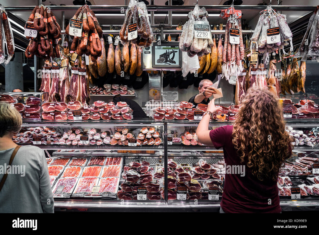 traditional cured meat and sausage shop in la boqueria market of ...