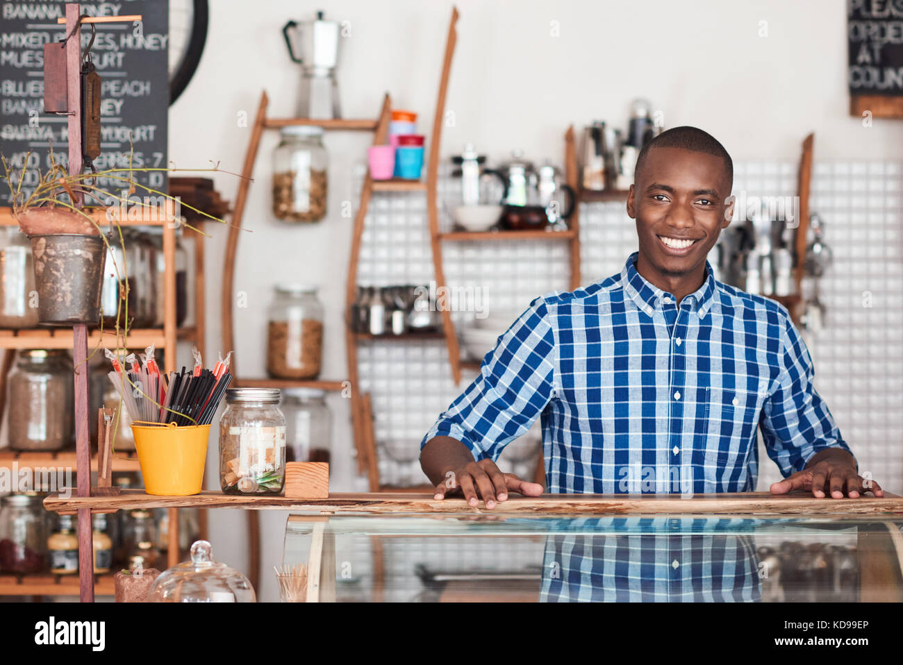 Male staff working behind counter hi-res stock photography and images ...